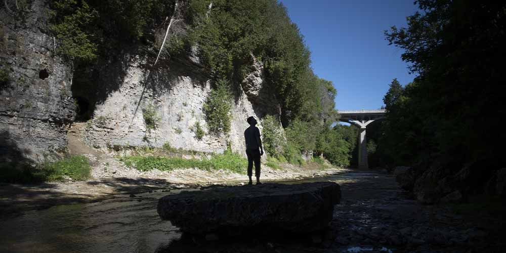 Person Tripping Over A Rock